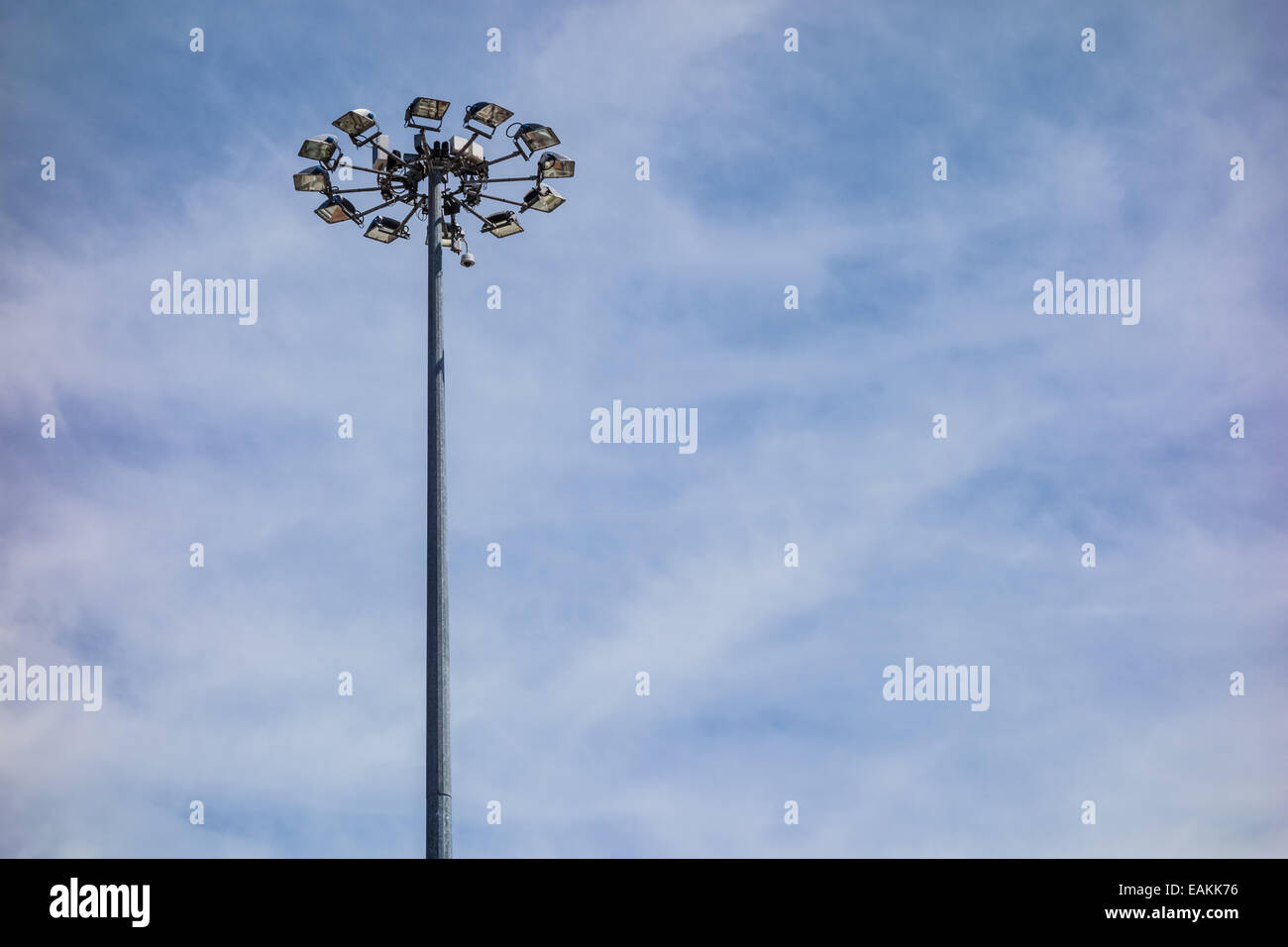 a lamp post with multiple reflectors in a parking lot Stock Photo - Alamy