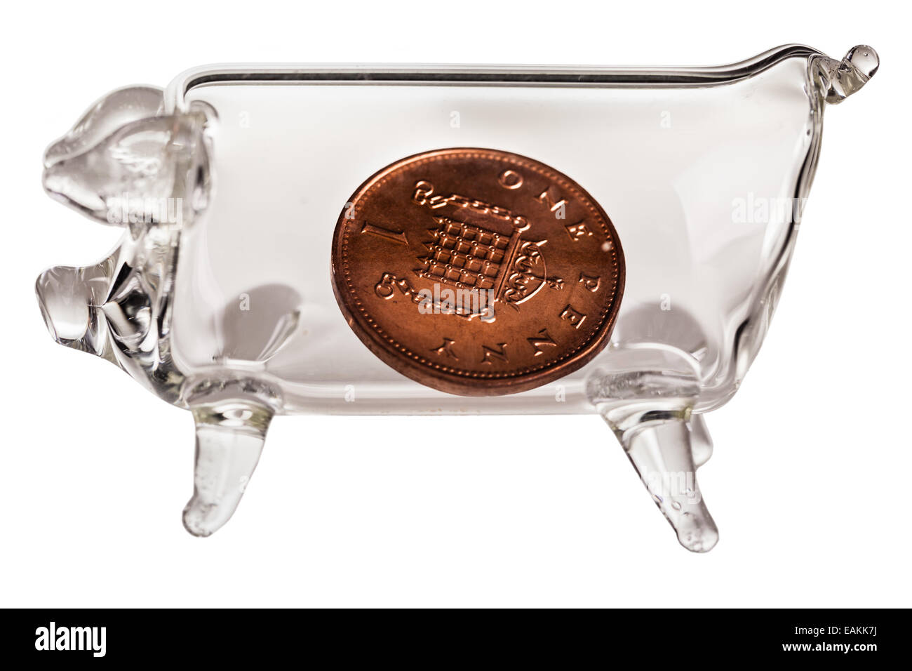 a glass piggy bank with a penny inside isolated over a pure white ...