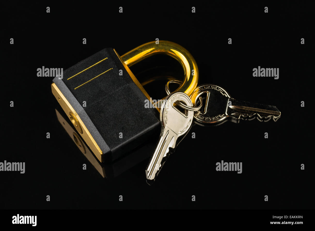hinged lock with keys on black background Stock Photo - Alamy