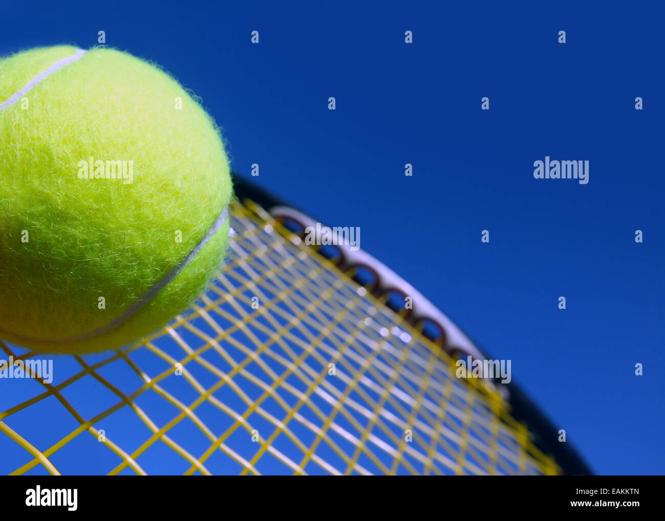 Ball and Racket against blue sky Stock Photo - Alamy