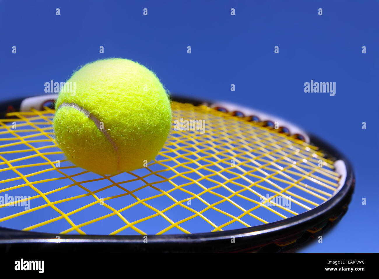 Ball and Racket agains blue sky Stock Photo - Alamy
