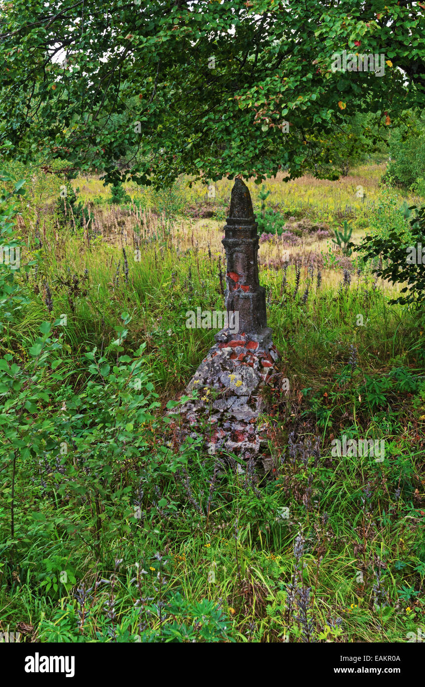 Forest landscape. Old monument for designation of the highest place ...