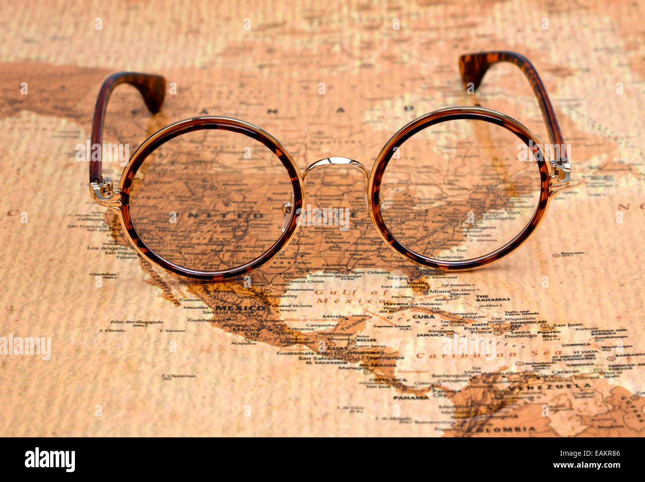 Glasses on a map of a world - United States Stock Photo - Alamy