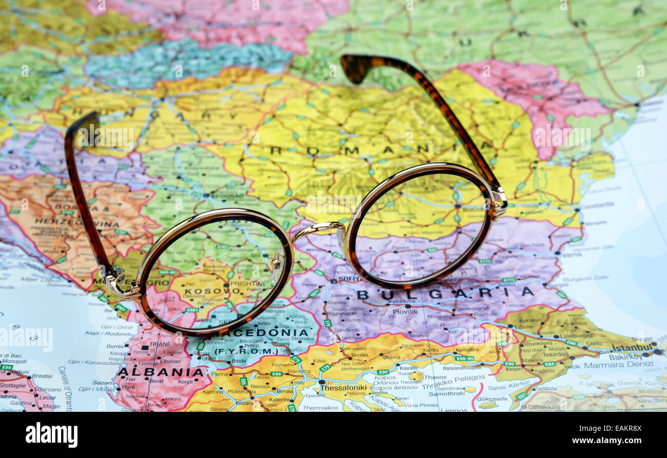 Glasses on a map of europe - Kosovo Stock Photo - Alamy