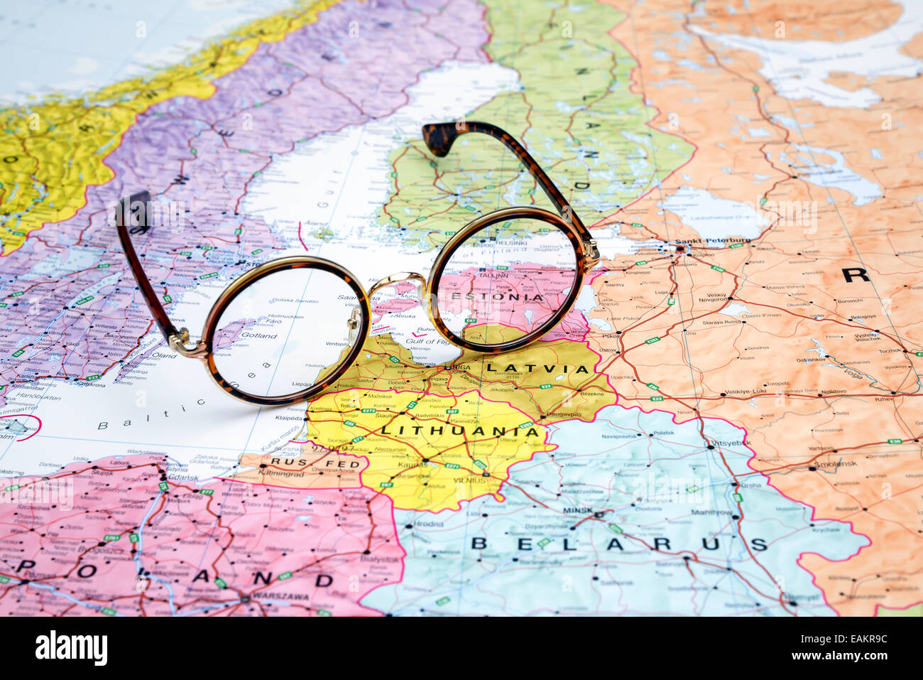 Glasses on a map of europe - Estonia Stock Photo - Alamy