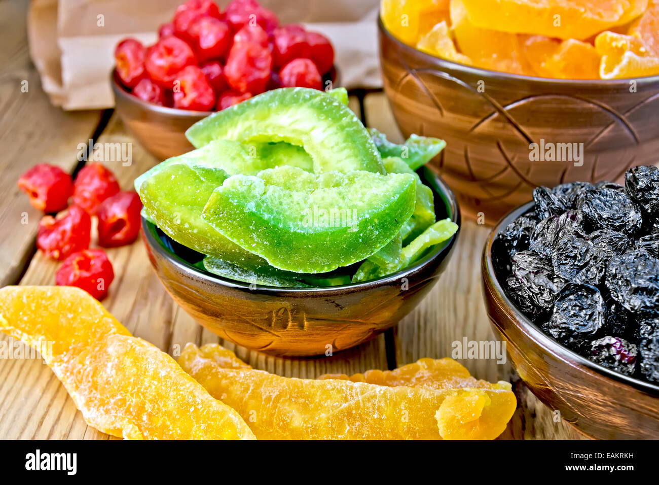 Candied pomelo and other fruits in bowl on board Stock Photo - Alamy