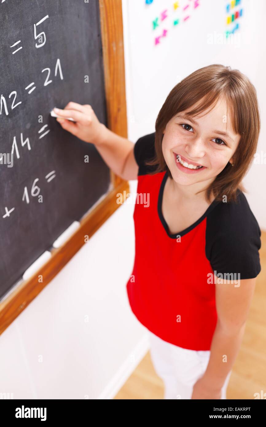 Teen solving equation board hi-res stock photography and images - Alamy