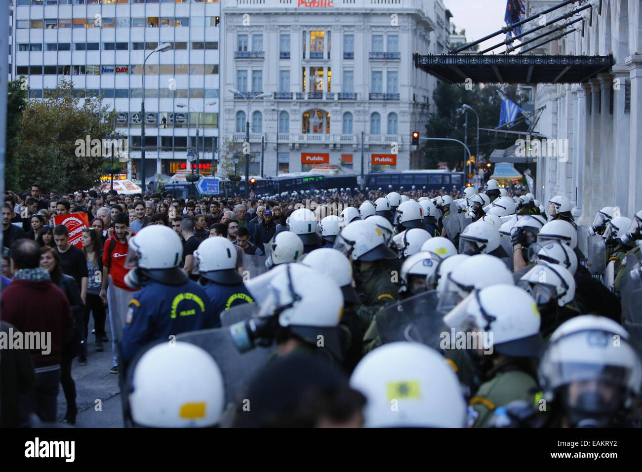 Athens, Greece. 17th Nov, 2014. Police officers in full riot gear watch ...