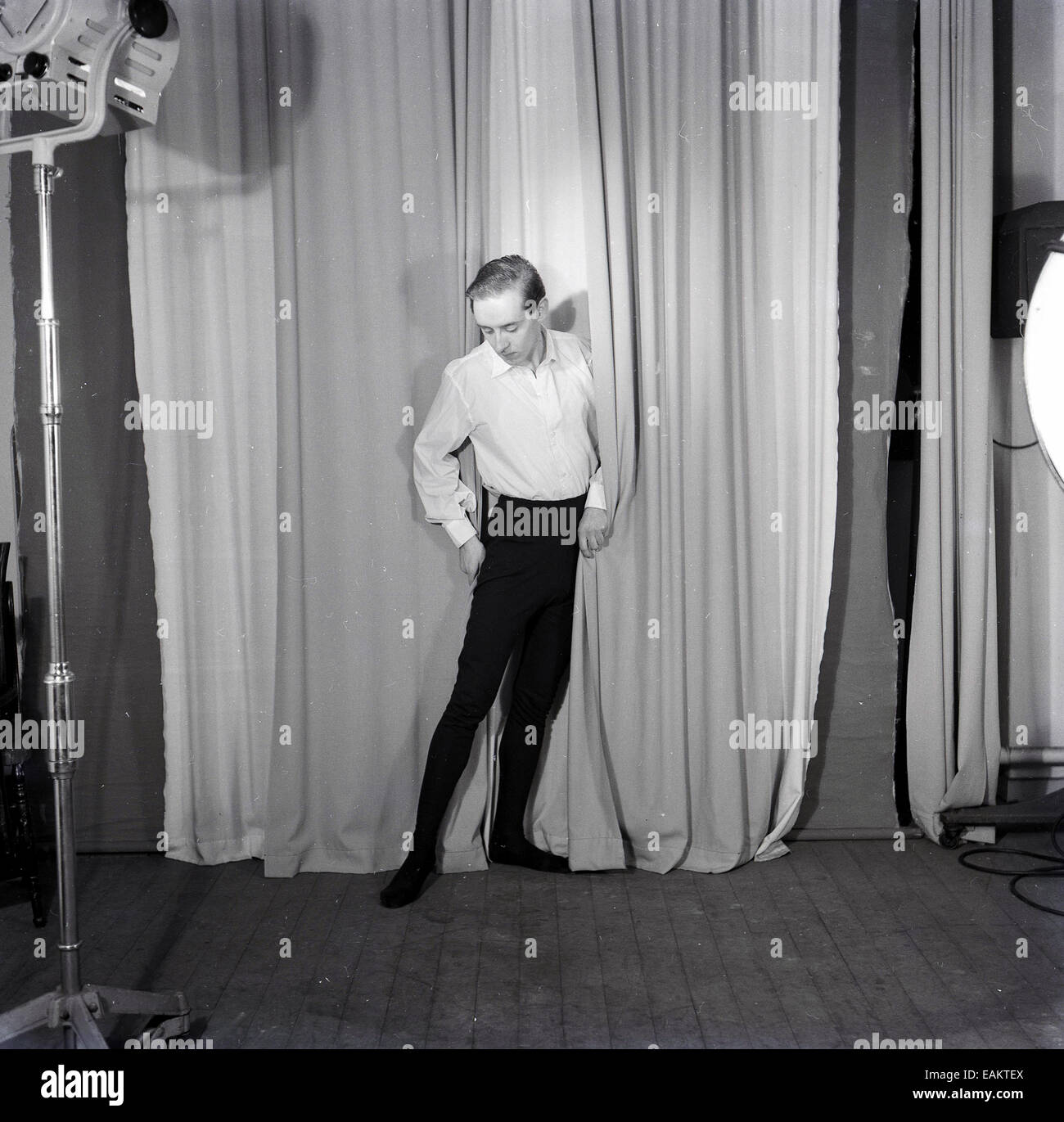 1950s, historical picture of a male dancer or performer practising or ...
