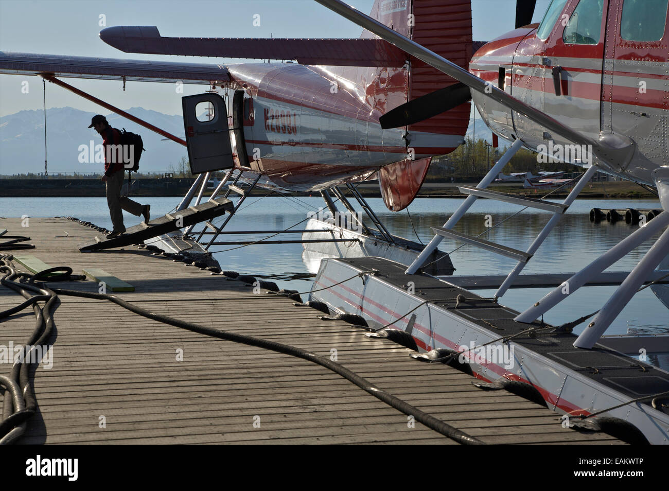 Pilot With Rust's Flying Service Departs From Floatplane Docked At Lake ...