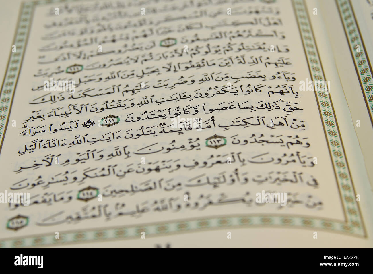 Close-up of arabic writing in a Koran Stock Photo - Alamy