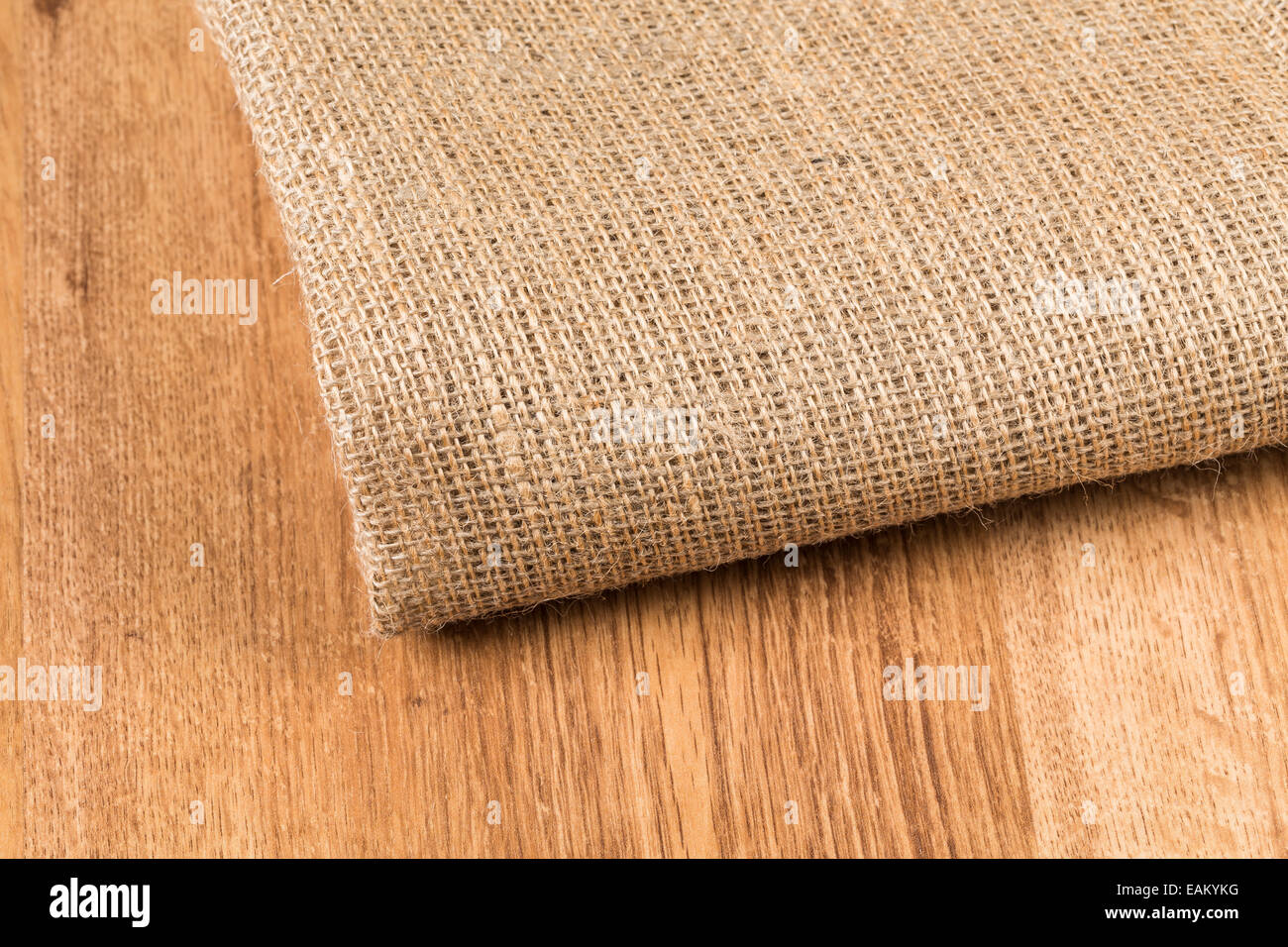 background made of old sackcloth on wooden table or floor Stock Photo ...