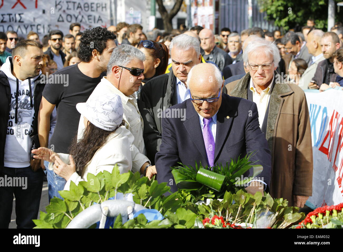 A man lays a wreath at the memorial to the 1973 Athens Polytechnic ...