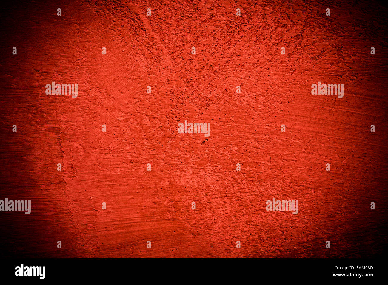 Red background wall texture with dark edges Stock Photo - Alamy