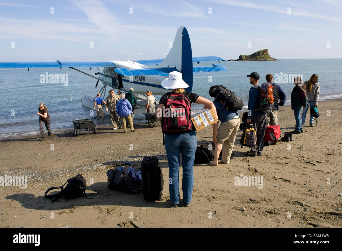 Loading Floatplane With Guests From Hallo Bay Bear Lodge In Kaguyak ...