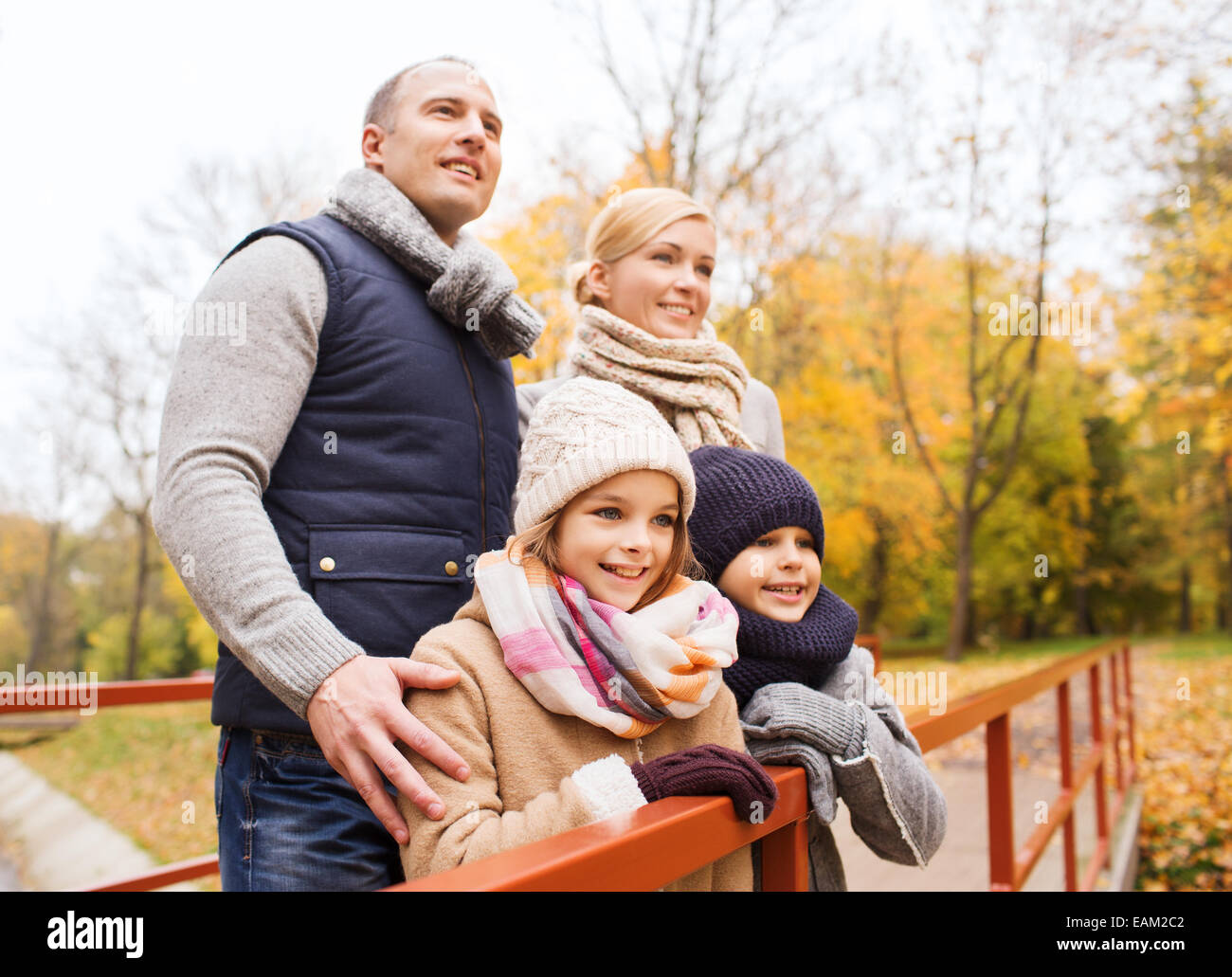 happy family in autumn park Stock Photo - Alamy