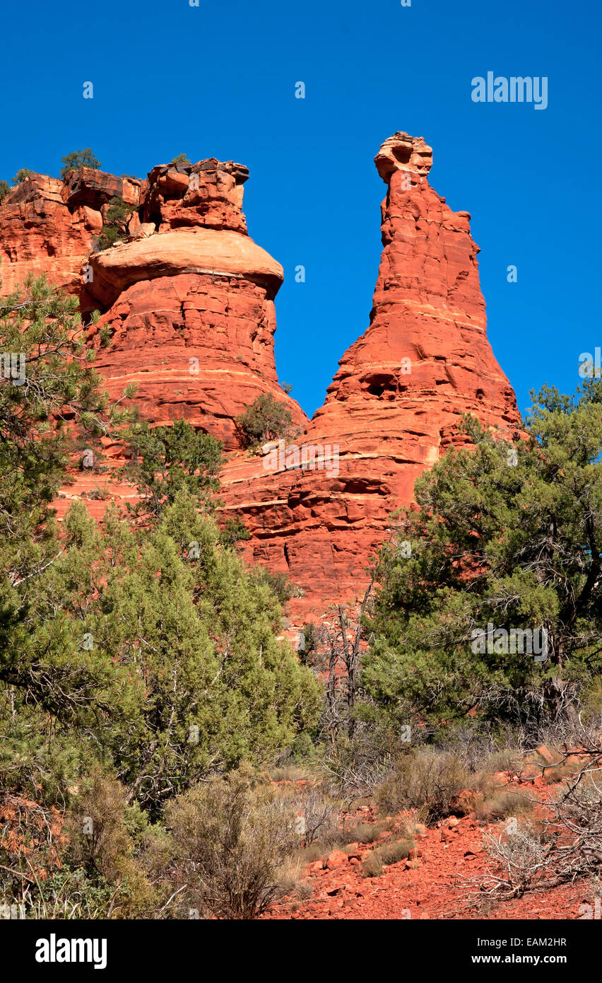 Red rock peaks tower over scrubs in the desert near Sedona Stock Photo ...