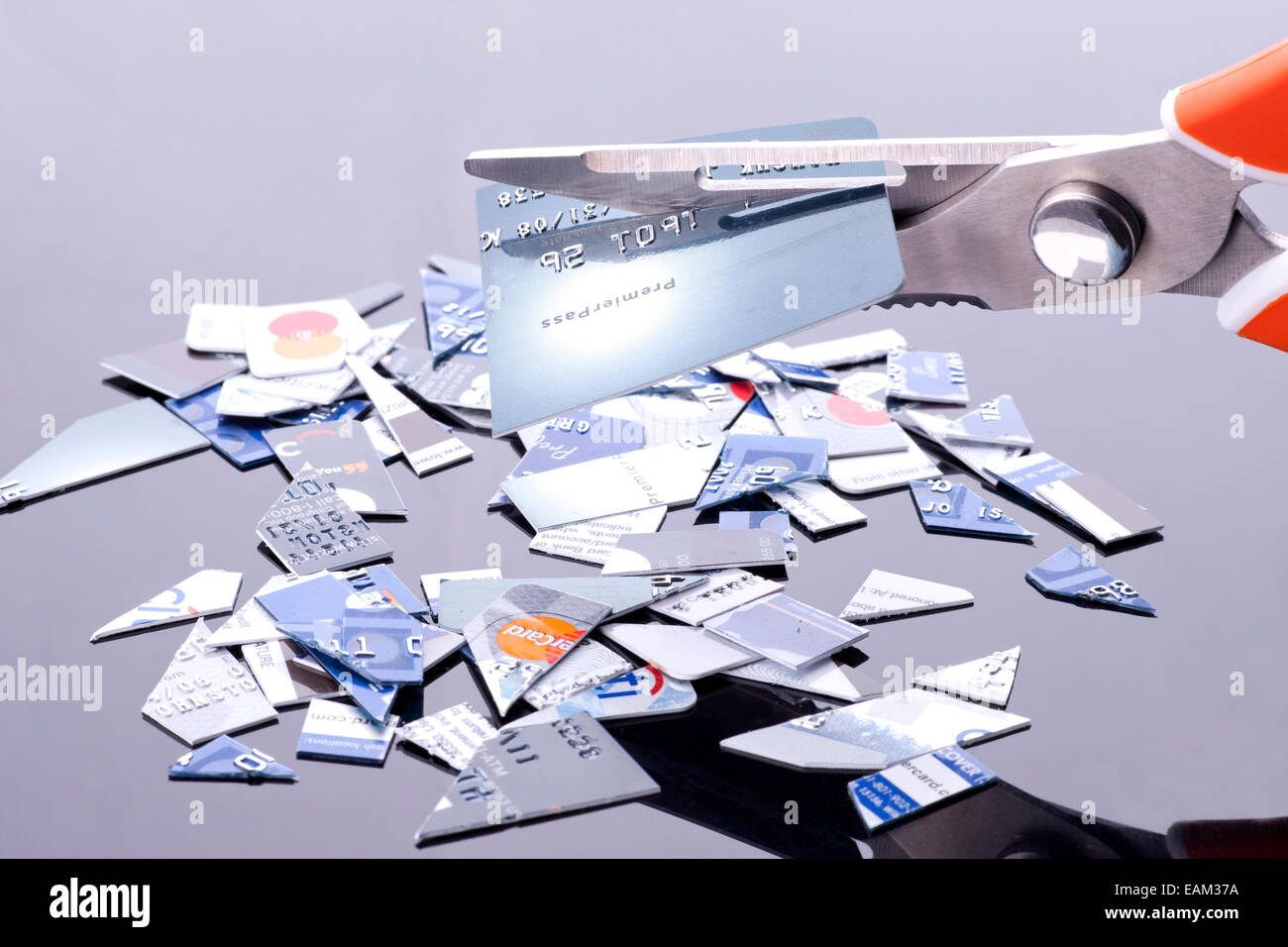 The act of cutting up credit cards for financial freedom Stock Photo ...