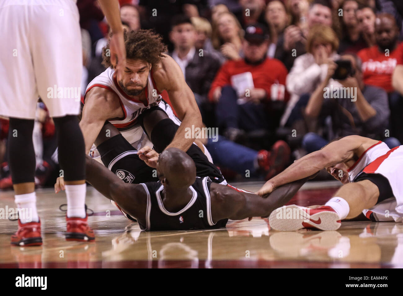 Nov. 15, 2014 - ROBIN LOPEZ (42) dives for a loose ball. The Portland ...