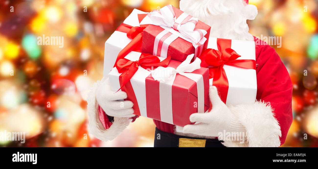 close up of santa claus with gift box Stock Photo - Alamy