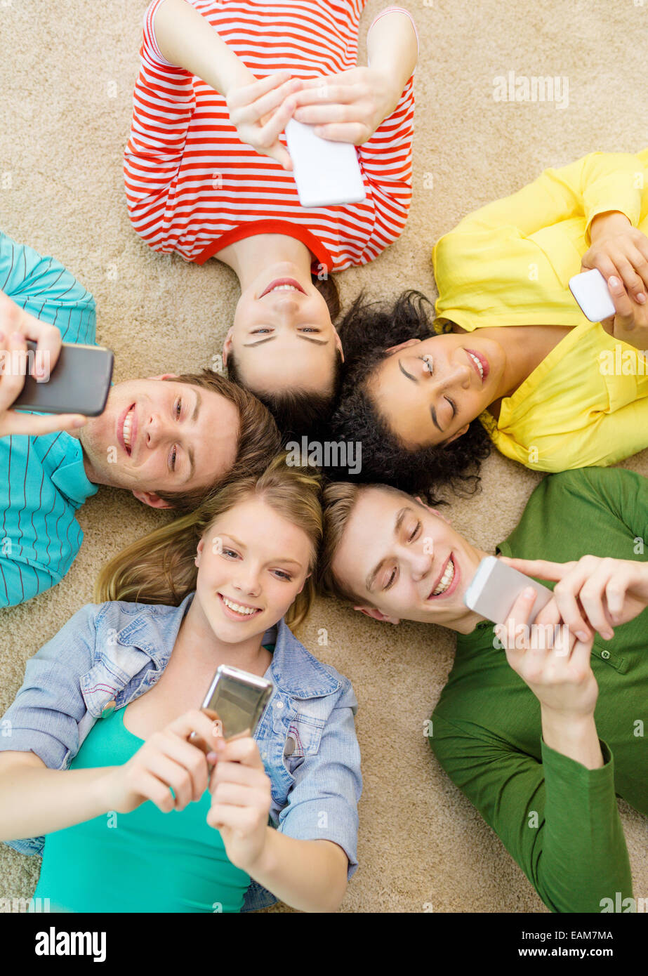Lying down on floor hi-res stock photography and images - Alamy