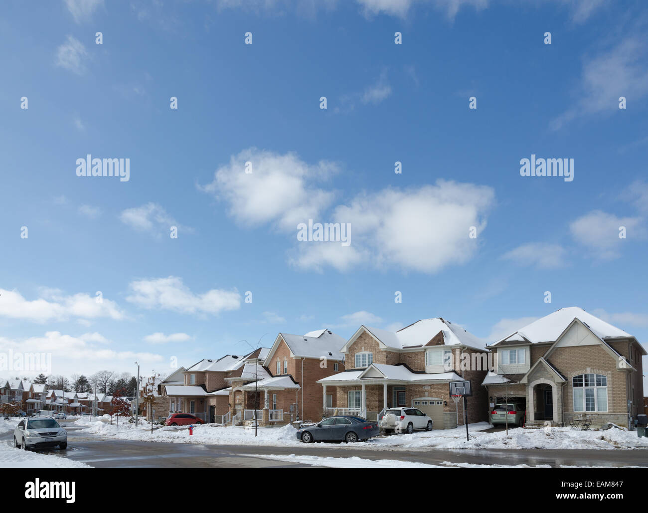 The Canadian small town road after snow fall Stock Photo - Alamy