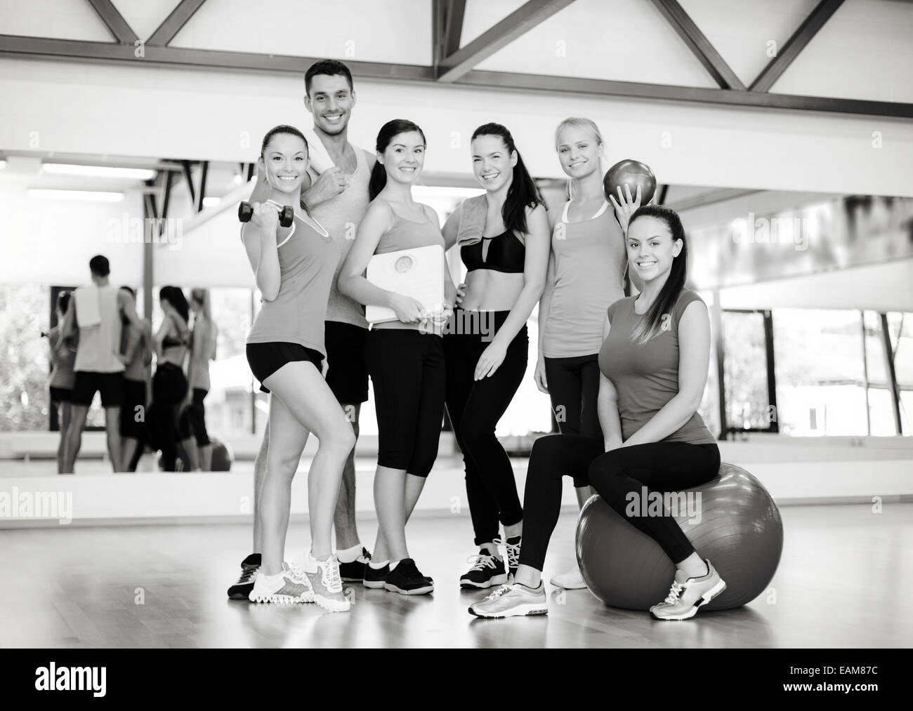 group of smiling people in the gym Stock Photo - Alamy