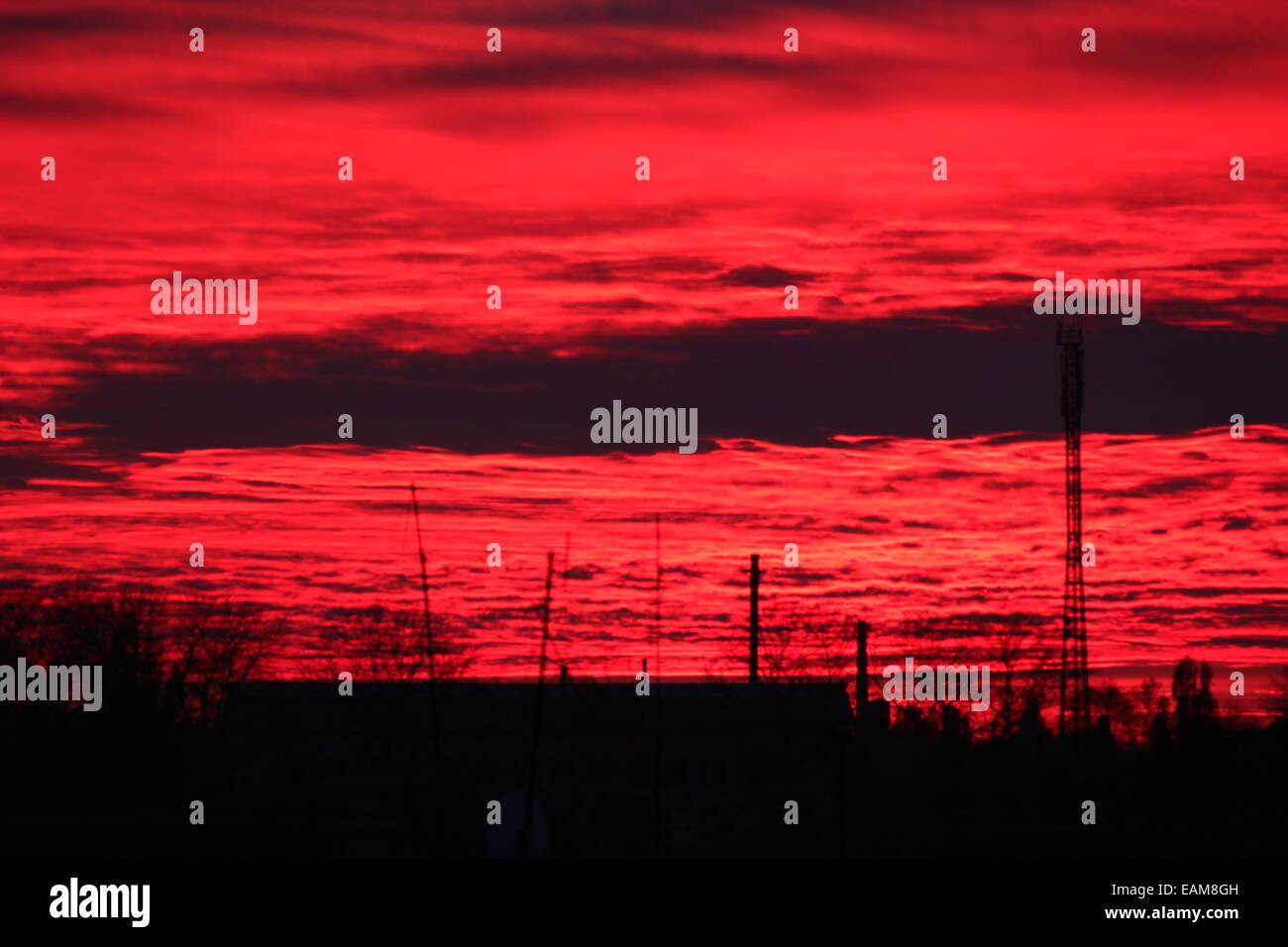 dark summer sunset above the multistory house Stock Photo - Alamy
