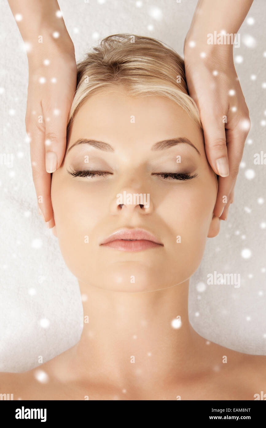 beautiful woman getting face or head massage Stock Photo - Alamy