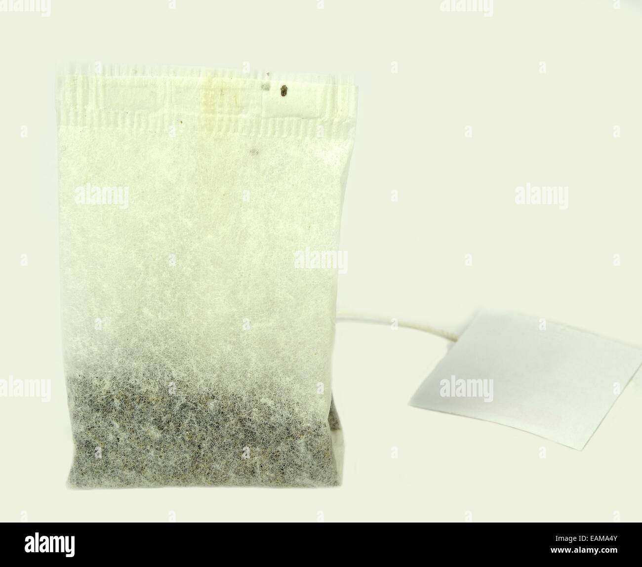 Single tea bag on a white background Stock Photo - Alamy