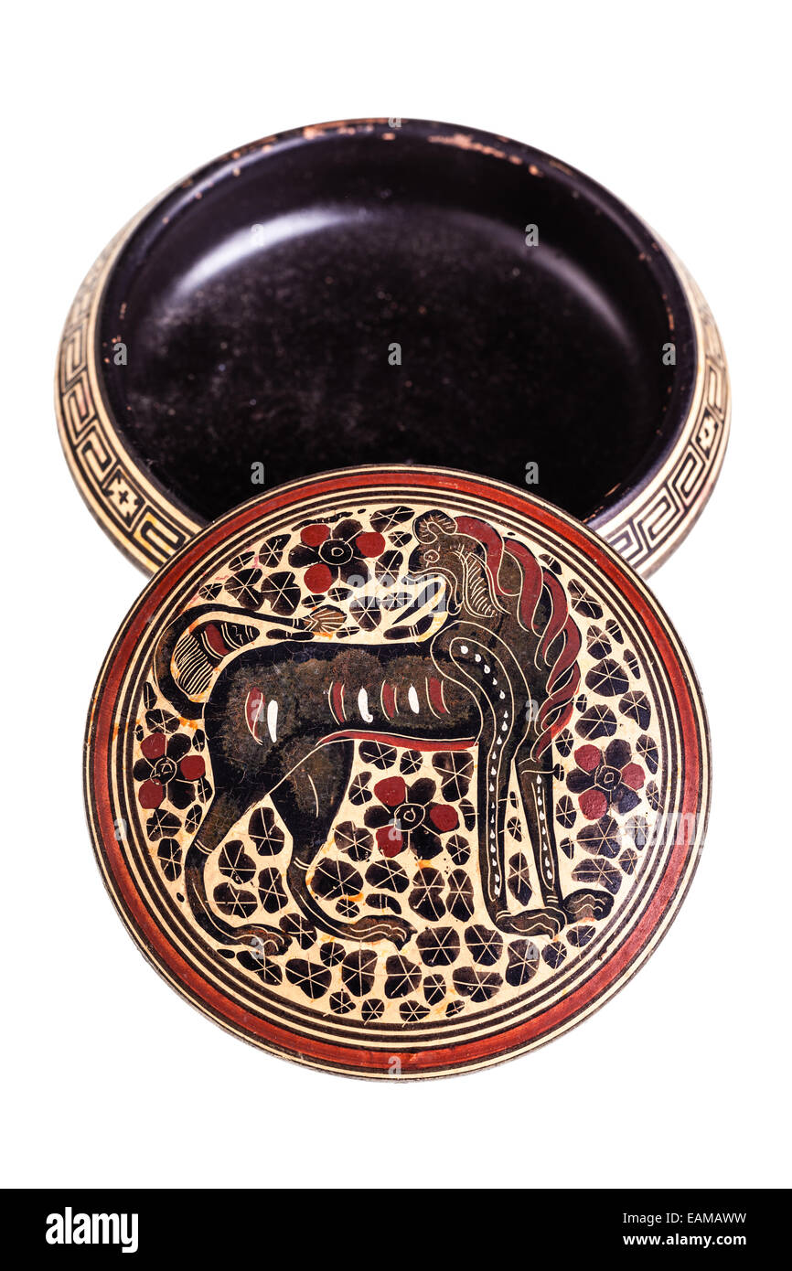 a small round ancient decorated ceramic box isolated over a white ...
