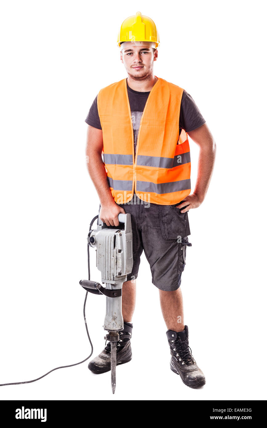 a young road worker wearing a hardhat and a visibility vest holding a ...