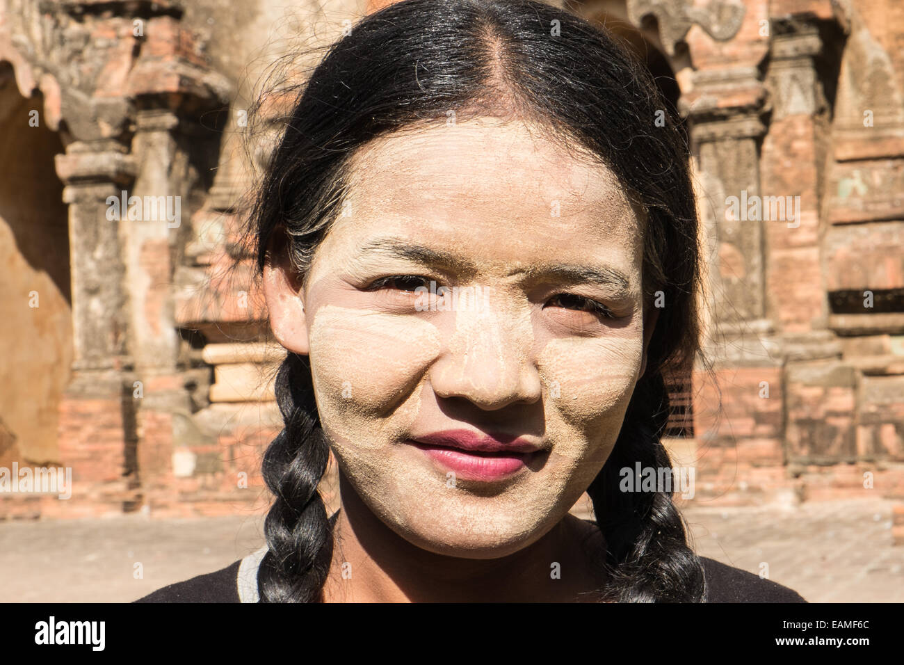 Family,boy,mother with thanaka bark cream face paint for cosmetic use ...