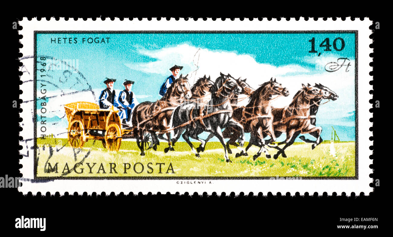 Postage stamp from Hungary depicting a farm wagon being drawn by seven ...