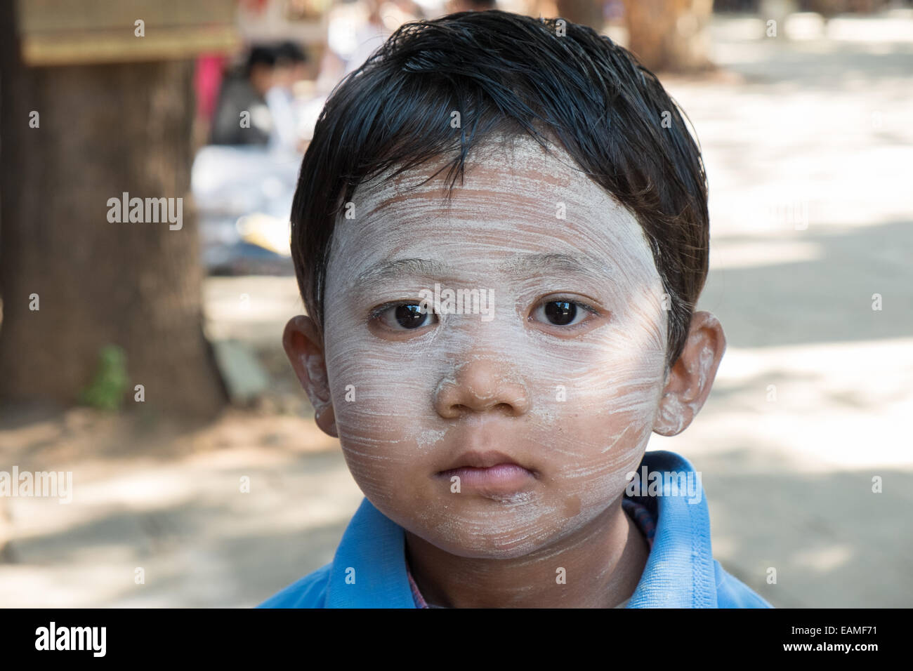 Family,boy,mother with thanaka bark cream face paint for cosmetic use ...