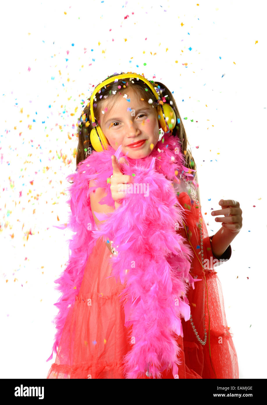 a pretty little girl with a pink feather boa on the white background ...