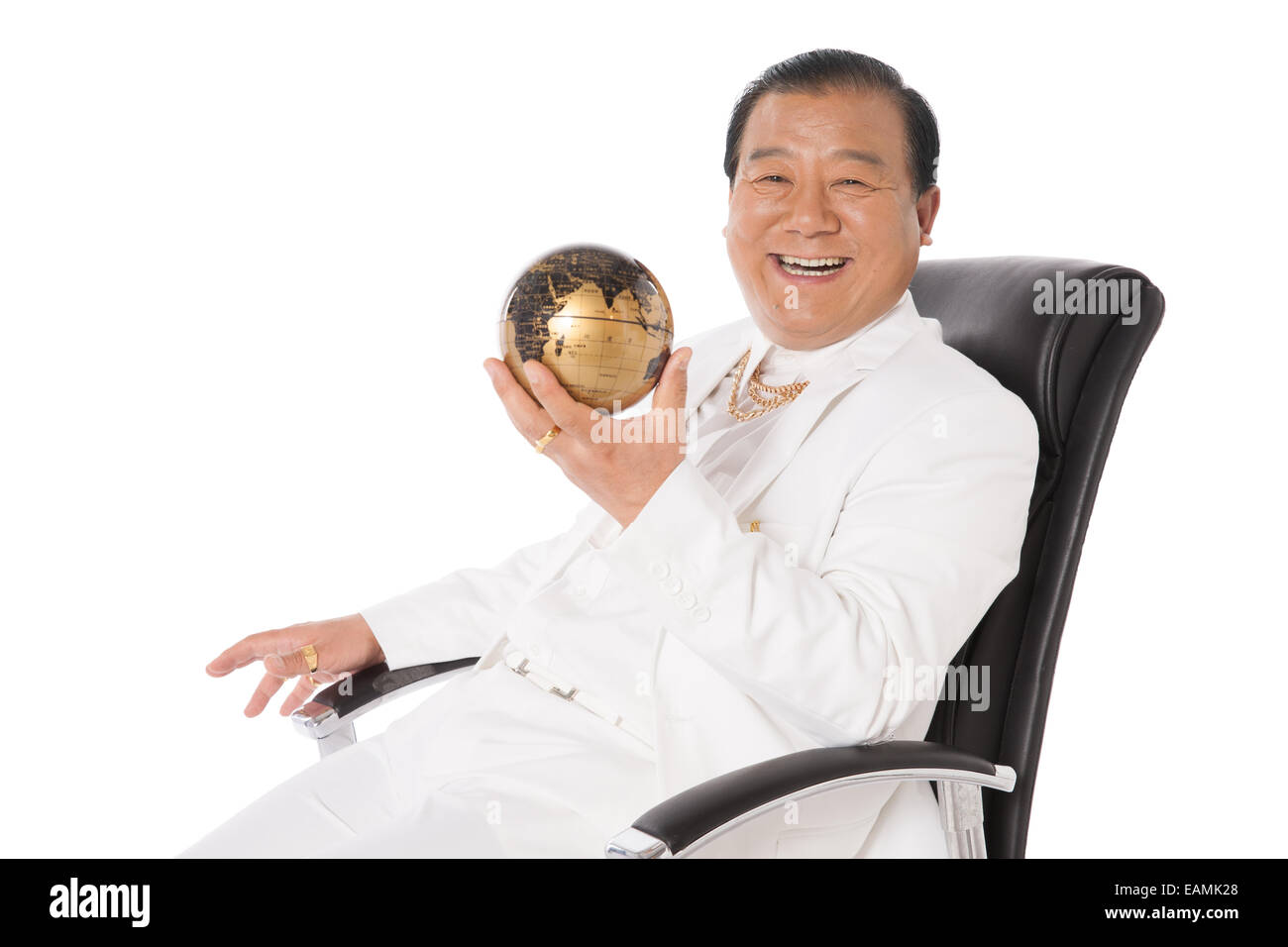 Successful man with a gold ingot Stock Photo - Alamy