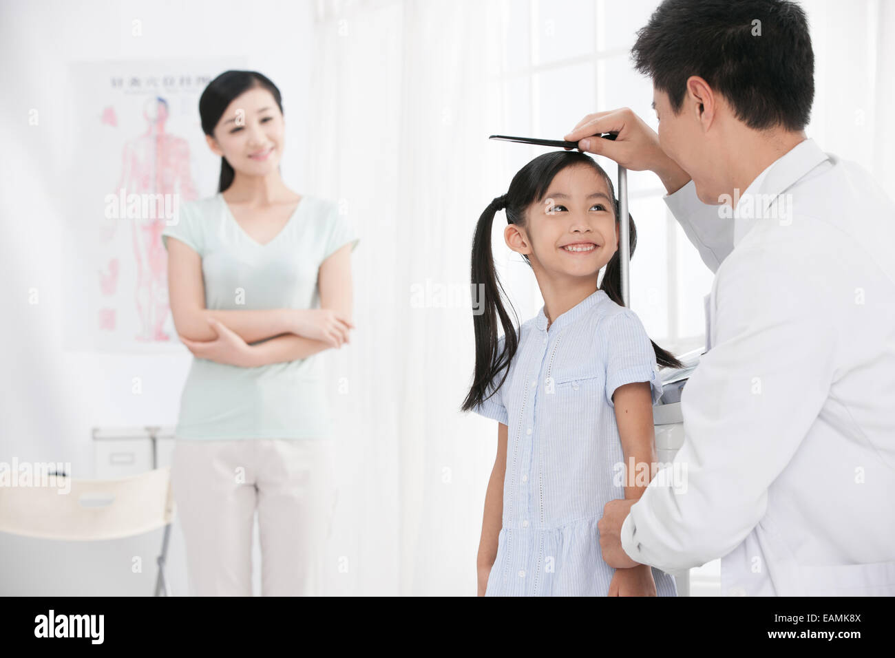 Children's measuring height Stock Photo - Alamy