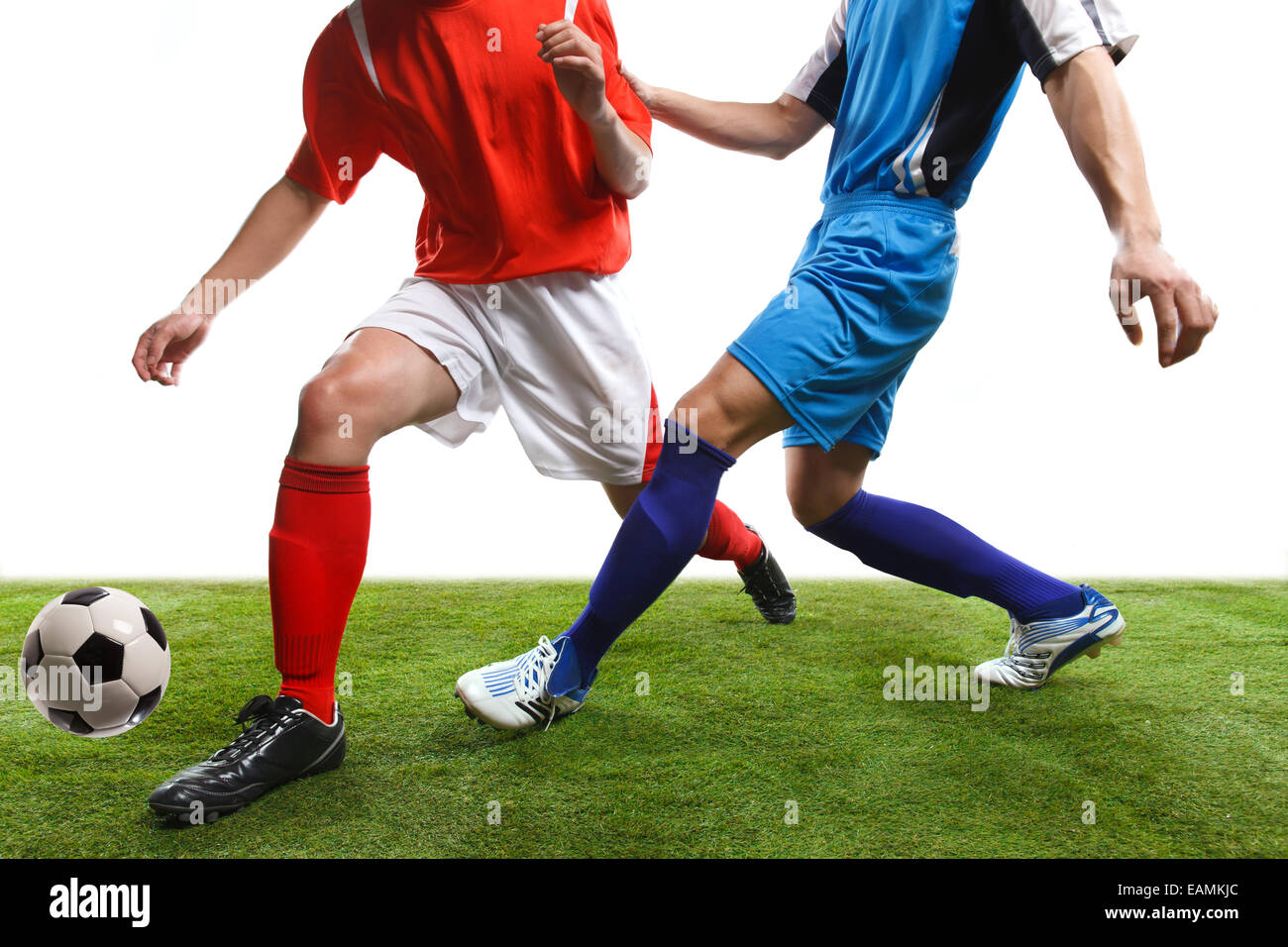 Two footballers to rob the ball Stock Photo - Alamy