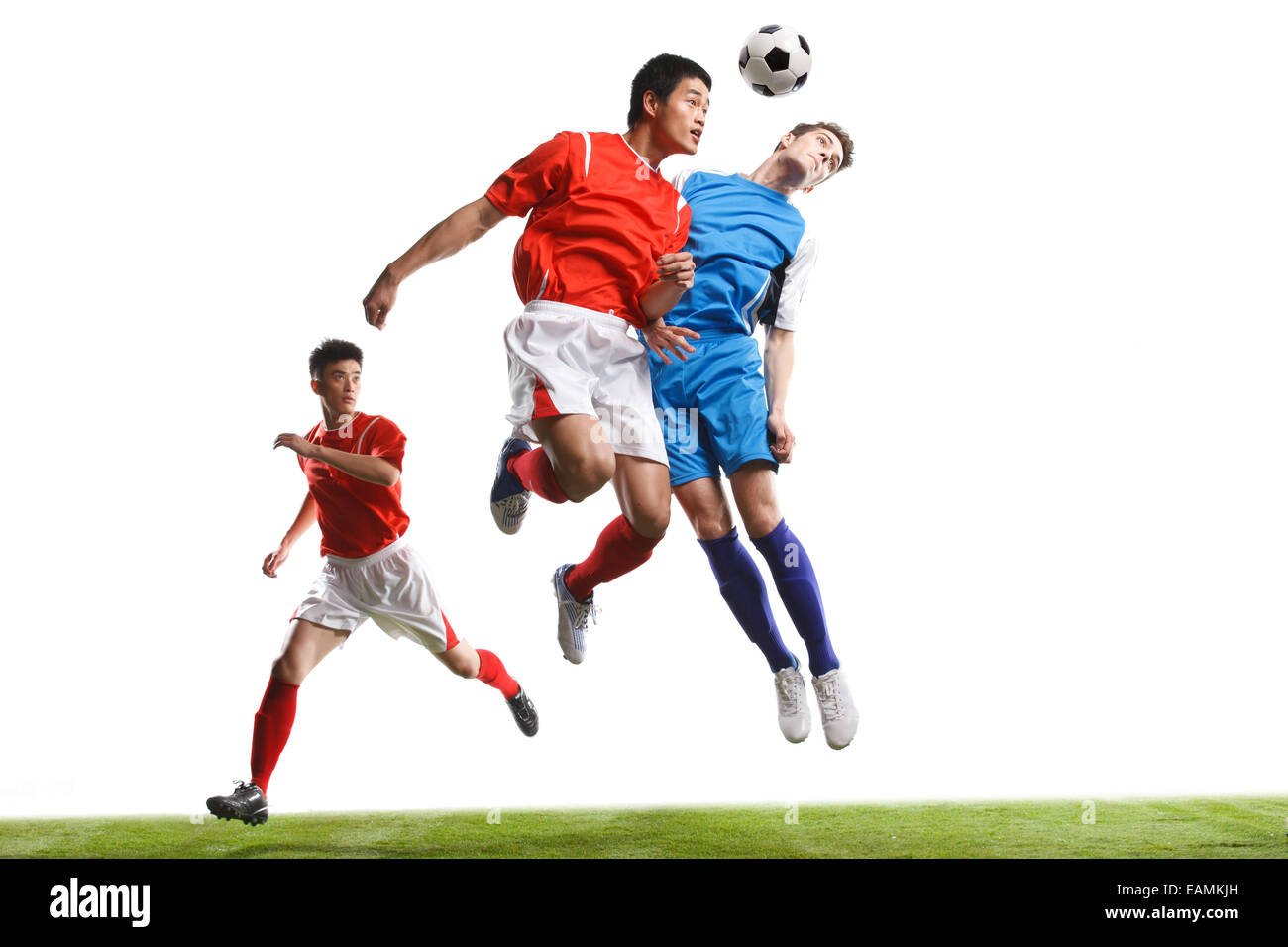 Three football players in football Stock Photo - Alamy