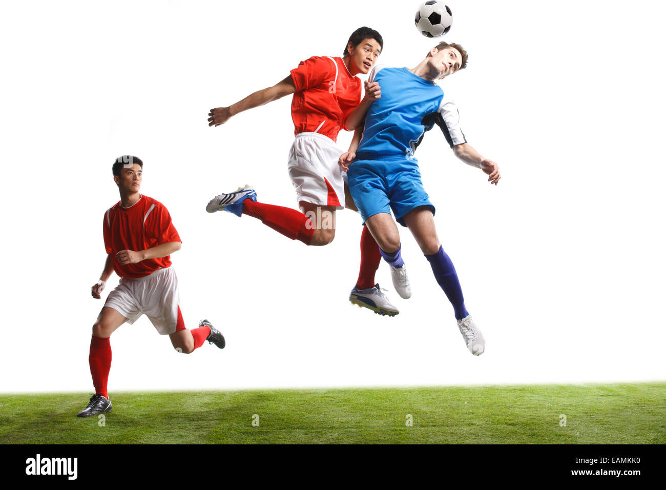 Three football players in football Stock Photo - Alamy