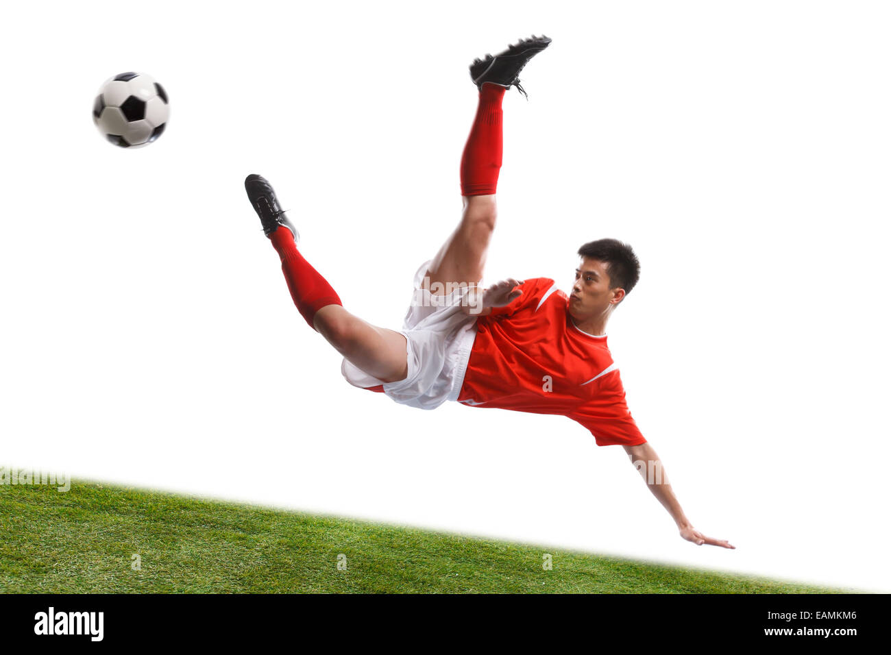 The football player handstand to play football Stock Photo - Alamy
