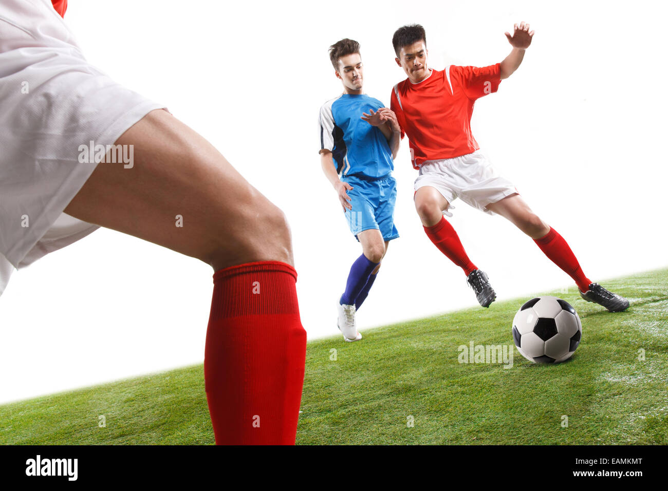 Football players are playing Stock Photo - Alamy