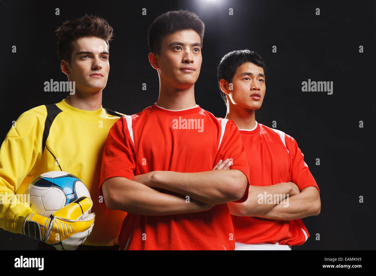 Football player standing arms crossed hi-res stock photography and ...