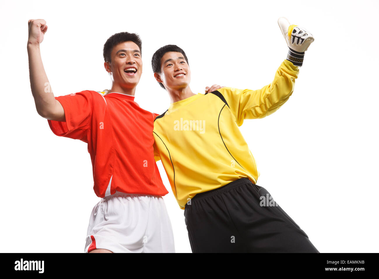 The two football players celebrate your success Stock Photo - Alamy