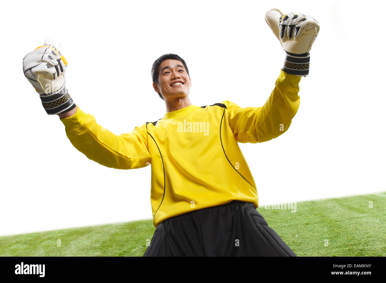 An exciting goalkeeper with open arms Stock Photo - Alamy