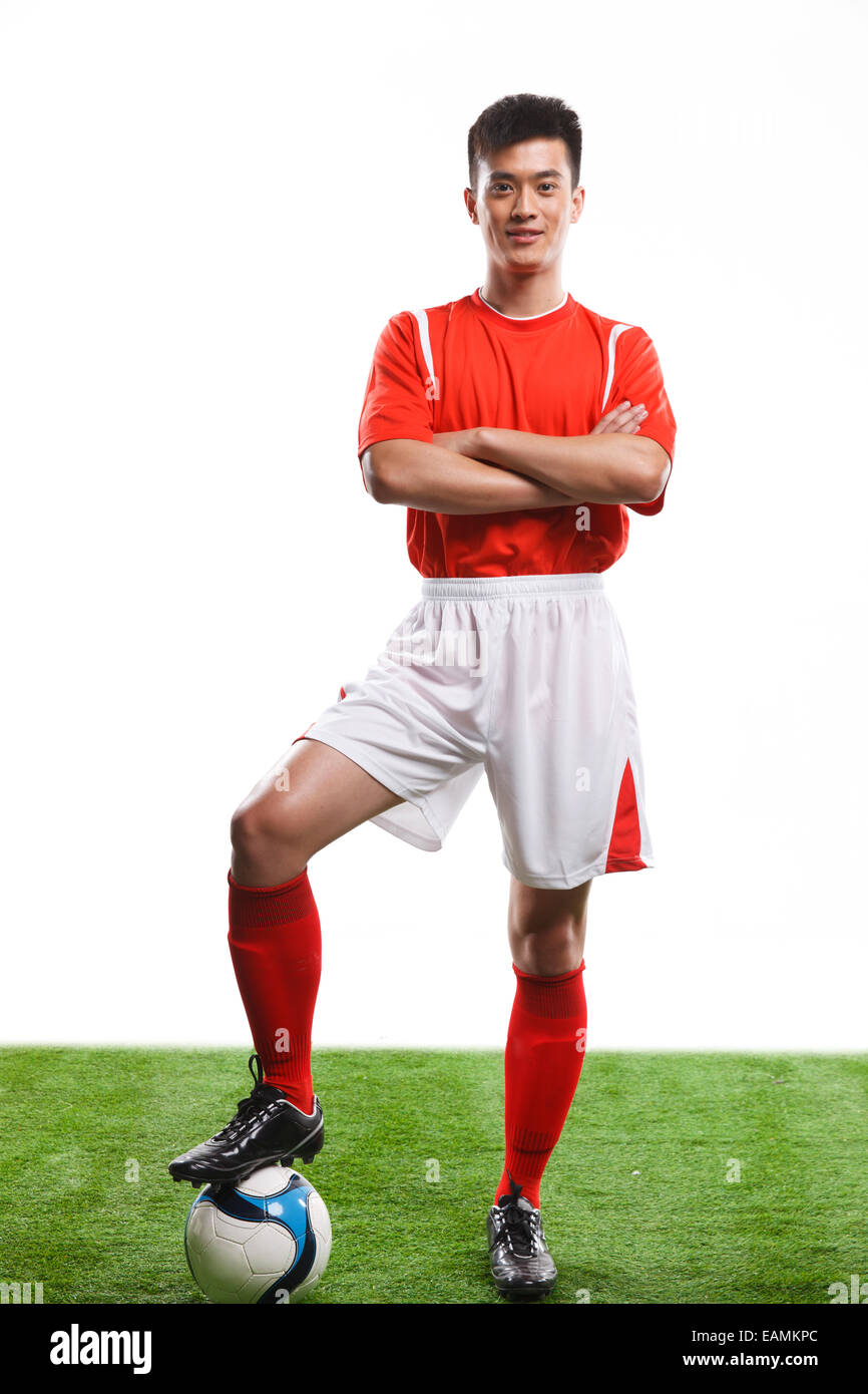 Football player standing arms crossed hi-res stock photography and ...