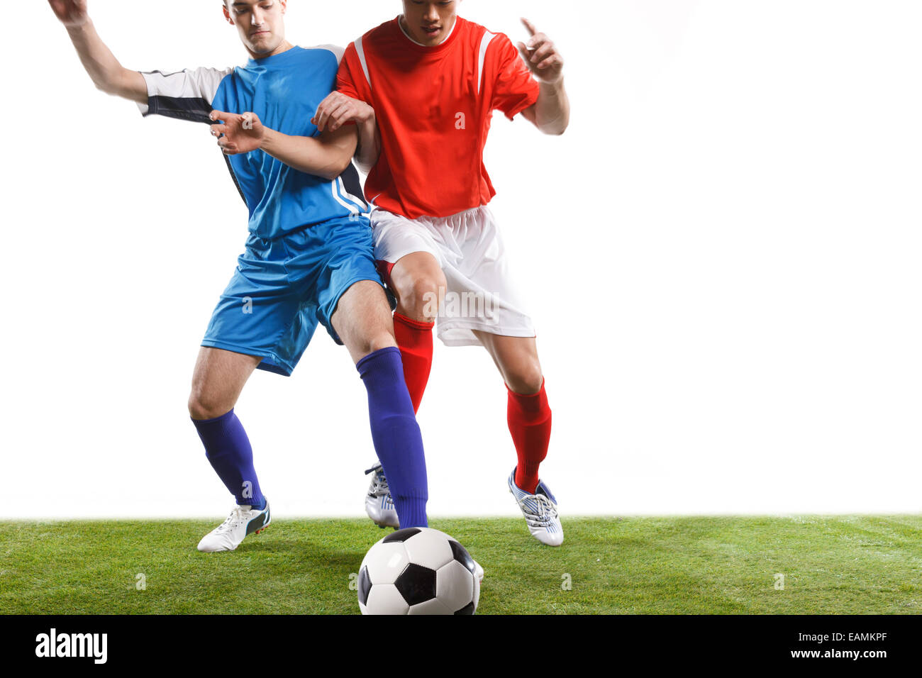 Two football players are playing football Stock Photo - Alamy