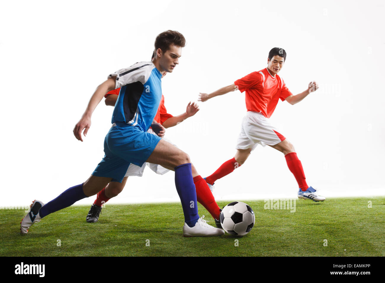 Football players are playing Stock Photo - Alamy
