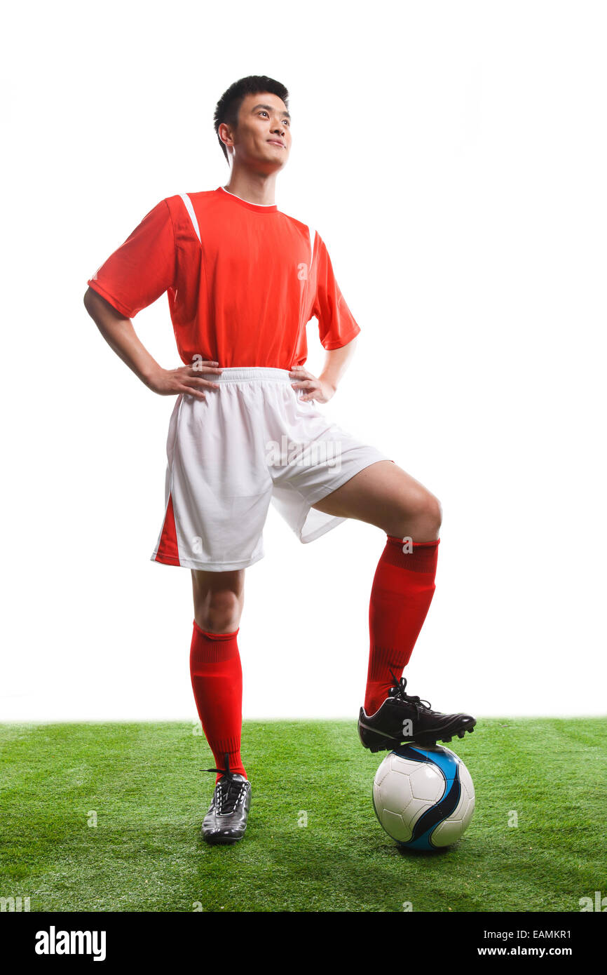A confident football player Stock Photo - Alamy